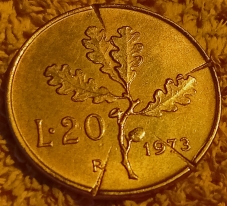 20 lire 1973 con difetto di conio,  e tagli anomali