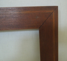 Cornice in legno con intarsi