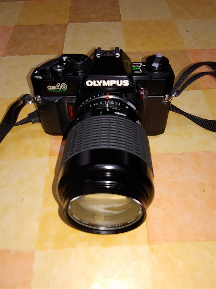 OLYMPUS OM 40 PROGRAM